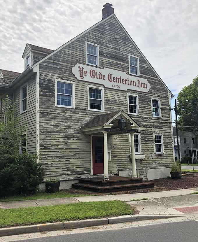 Weathered clapboard siding tells stories of centuries past while that Old English lettering adds serious historical gravitas.