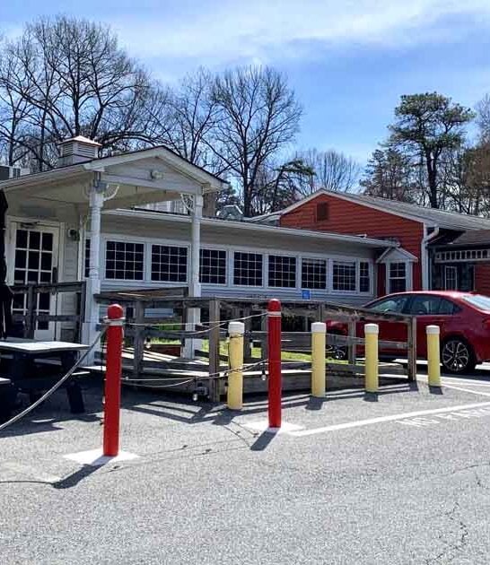 This Rustic Maryland BBQ Joint Serves A Monstrous Pulled Pork Sandwich You Have To See To Believe
