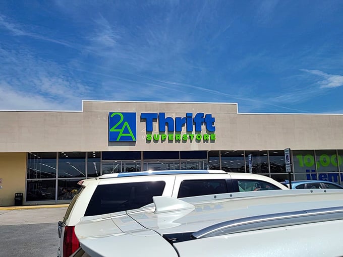 That bold blue and green sign against a clear sky is basically a beacon calling your wallet home.
