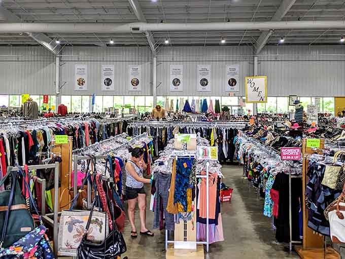 Organized chaos never looked this good, with pants, tops, and blazers lined up like soldiers at Durham Rescue Mission Thrift Store Brier Creek.