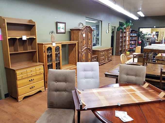 Solid wood dressers, armoires, and dining sets line the floor, proving treasure really does hide in plain sight.