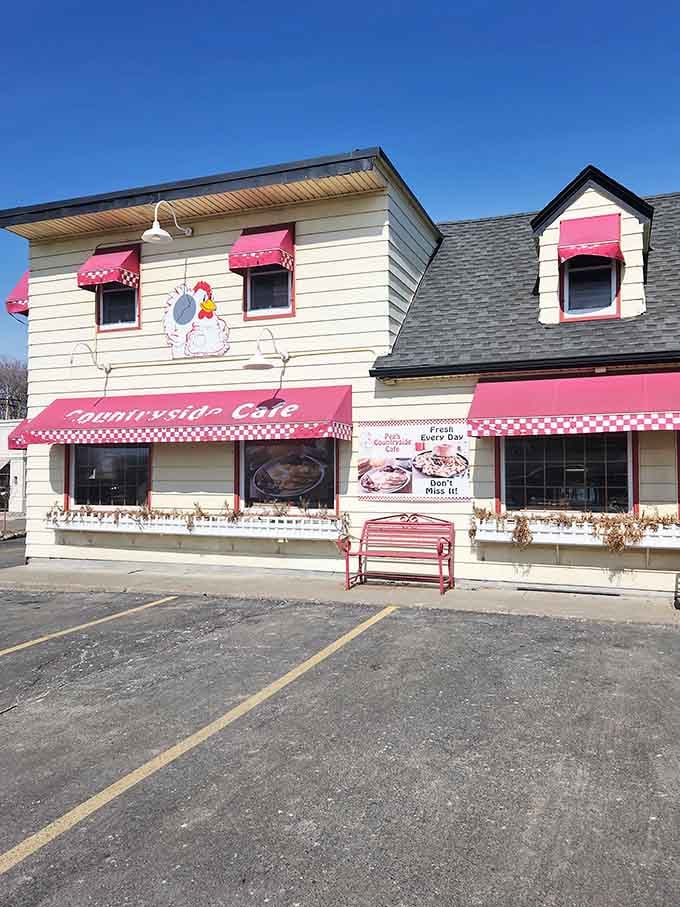 That cheerful chicken isn't just decoration, it's a promise of the breakfast magic waiting inside this charming spot.
