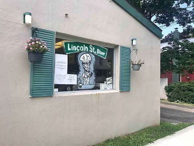 That hand-painted chef in the window isn't just decoration. He's basically saying, "Yes, something wonderful is happening in here."