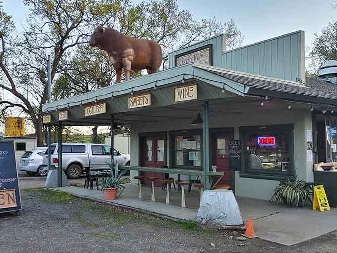 The rooftop cow stands watch over BBQ, beer, local beef, sweets, and wine, basically everything you need for happiness.
