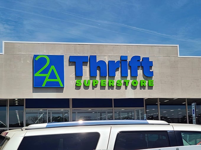 That bold blue and green sign against a clear sky is basically the thrift world's version of a welcome mat.