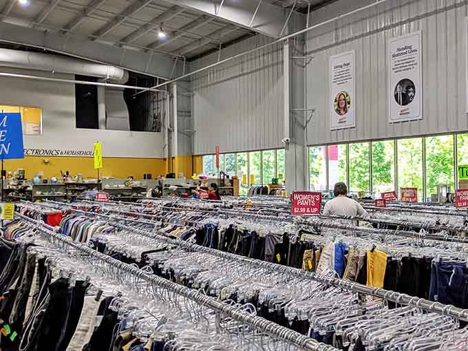 Row after row of color-sorted clothing at Durham Rescue Mission Thrift Store Brier Creek, where every rack hides a winner.