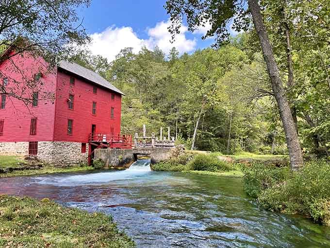 That red mill against rushing blue water is Missouri showing off, and honestly, good for it.