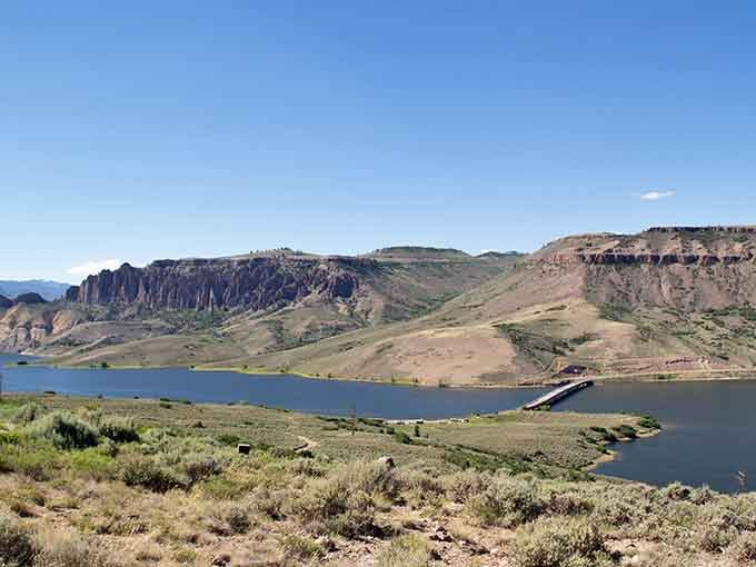 Dramatic rock spires, sagebrush, and deep blue water. Colorado really doesn't hold back.