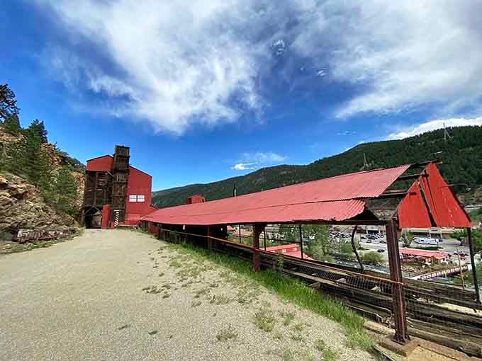 That big red building isn't just a pretty face. It's 130 years of Colorado gold rush history staring right back at you.