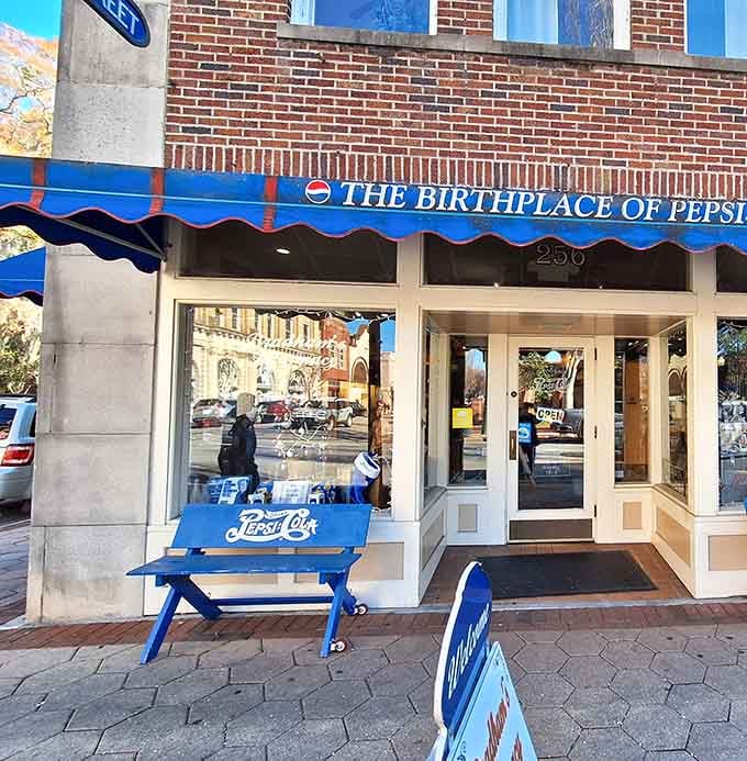That bold blue awning on Middle Street is basically a neon sign saying, "History lives here."
