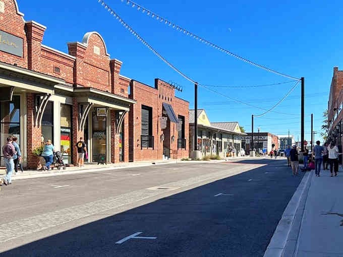 Beautifully restored storefronts invite leisurely strolls where actual conversation replaces endless scrolling through your phone's latest distractions.