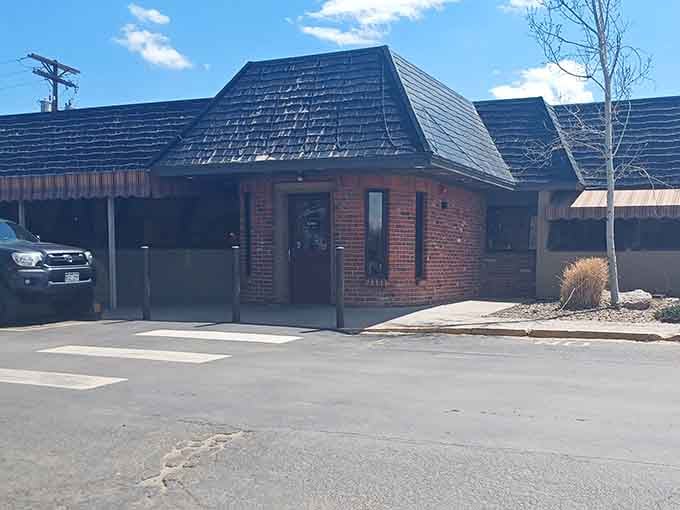 Brick walls, a dark roof, and a no-fuss entrance. The best meals always hide behind the simplest doors.