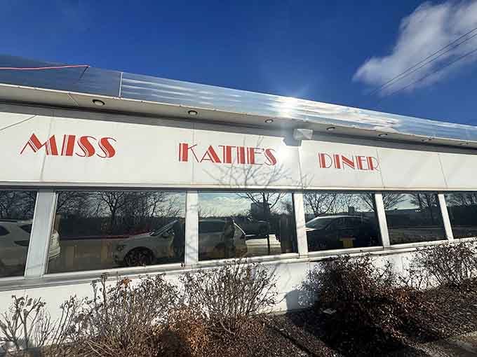 Miss Katie's Diner sits proudly on the street, its bold red lettering announcing something worth stopping for.