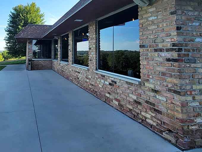 Brick walls, big windows, and a hilltop view that makes every meal feel like a special occasion.