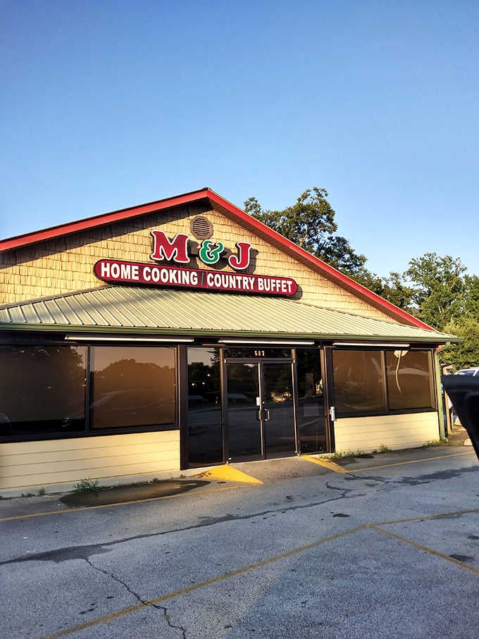 That cheerful red and green sign is basically a dinner bell for anyone who appreciates real Southern cooking.