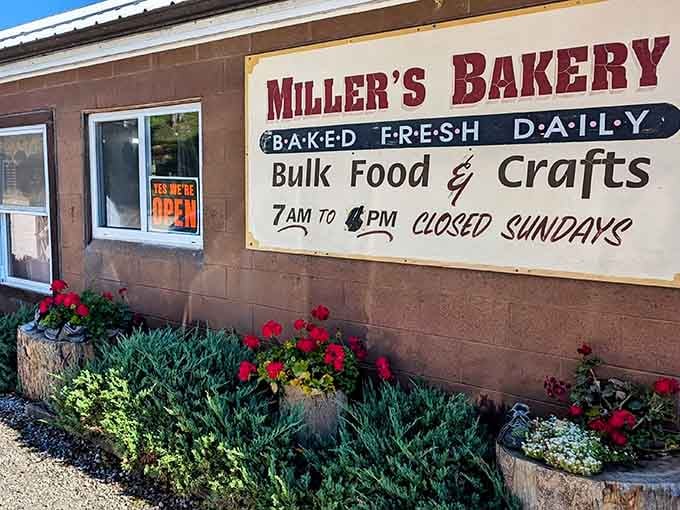 Miller's Bakery keeps it simple: fresh flowers, a bold sign, and zero pretension.