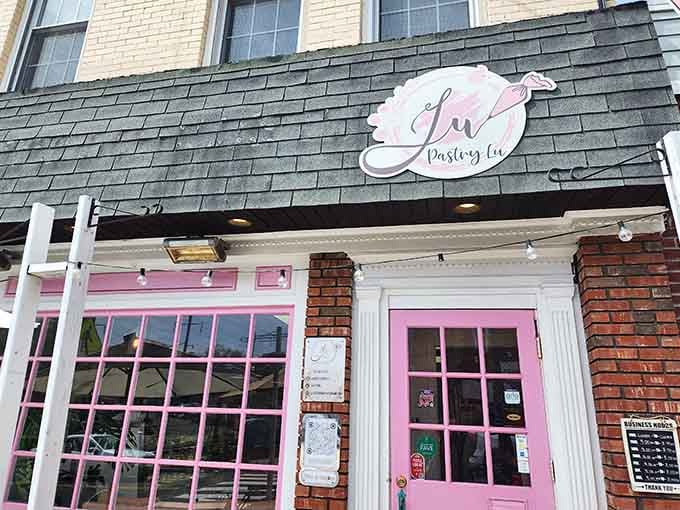 That pink storefront isn't whispering, it's announcing that something special lives here on Main Street.