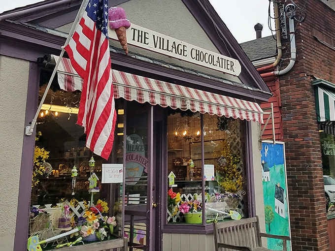 That charming awning and storefront practically whisper "come inside" louder than your sweet tooth already is.