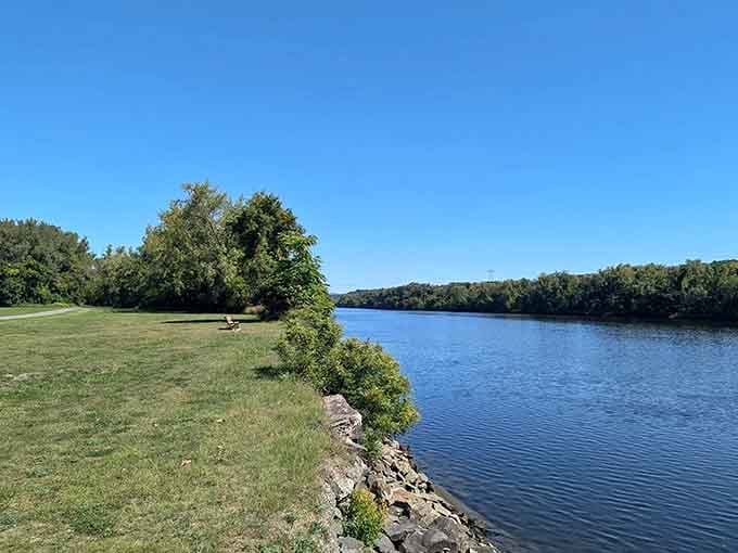 That wide blue sky and glassy river make this Hudson riverfront view almost too good to be real.