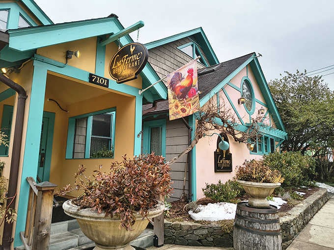 That teal trim and warm yellow exterior isn't showing off, it's just being effortlessly charming on a Tuesday afternoon.