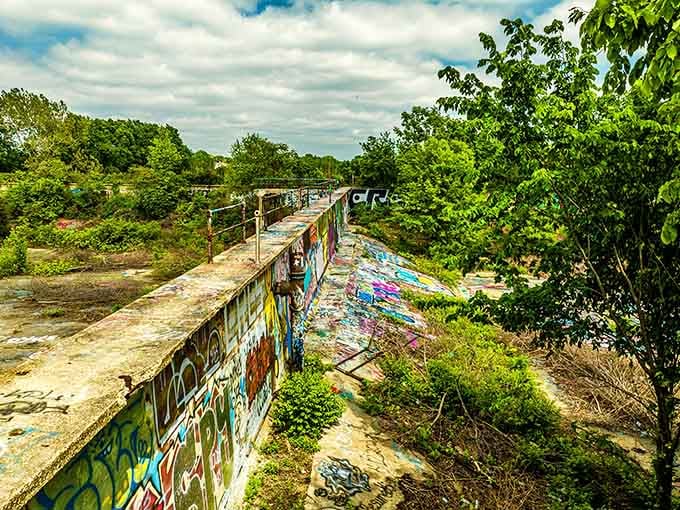 Nature's patient takeover meets human creativity in this forgotten corner of Kansas City's urban landscape.