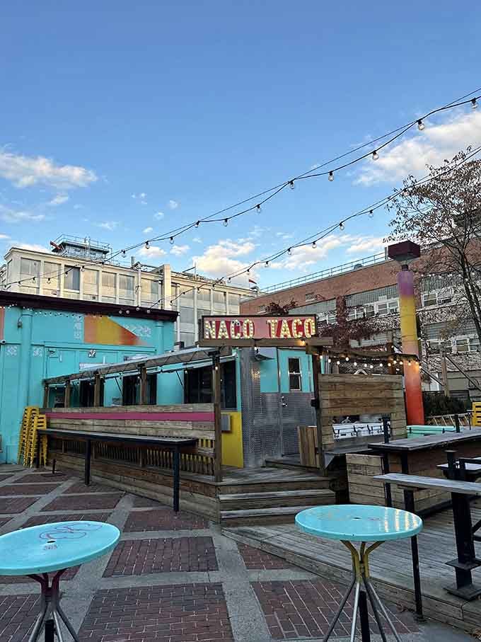 That turquoise exterior isn't subtle, and honestly, it shouldn't be. Naco Taco announces itself like a party you actually want to attend.