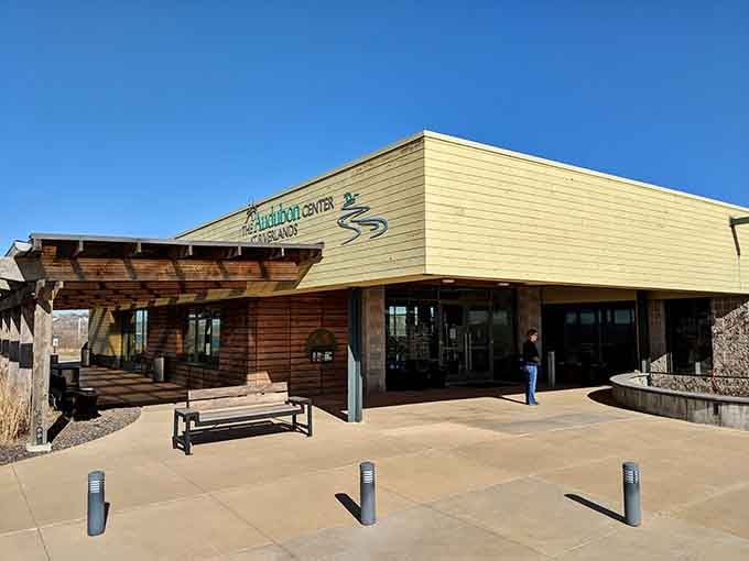 The Audubon Center's welcoming entrance combines rustic timber beams with modern design, inviting you into nature's theater.