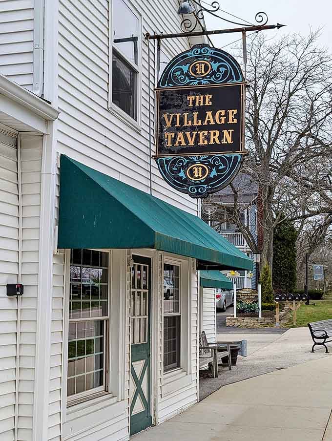 That ornate hanging sign beckons like a lighthouse for the hungry, promising comfort food and good times within those historic walls.