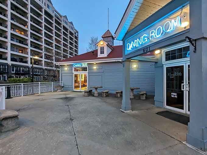The blue glow of "DINING ROOM" beckons like a lighthouse guiding hungry sailors to shore.