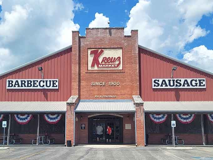 That red barn facade has been calling hungry Texans to Lockhart like a smoke-scented dinner bell since 1900.