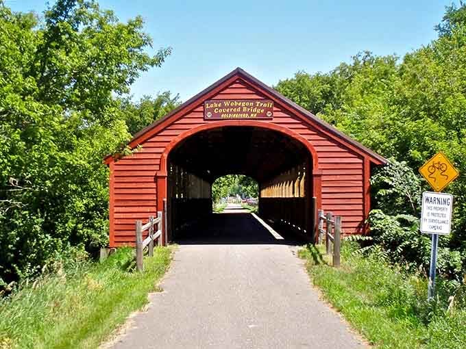 That barn-red entrance isn't just a bridge, it's Minnesota saying, "You're welcome."
