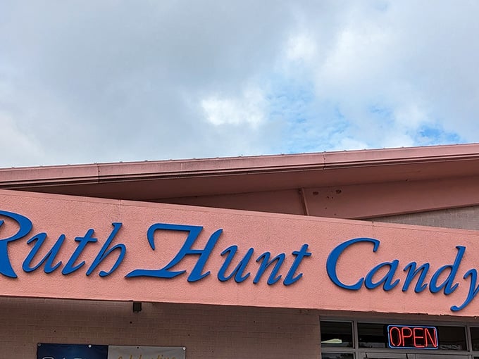 When a sign reads "Ruth Hunt Candy" against a rosy pink wall, you already know something wonderful is waiting inside.