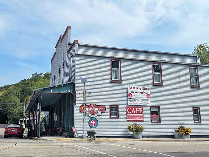 The historic building wears its "Best Pie Shop in America" sign like a well-deserved badge of honor earned through flaky crusts.