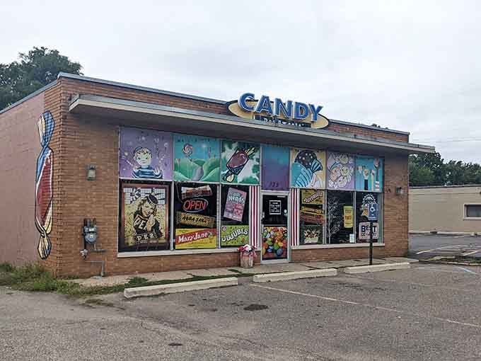 Under a wide Michigan sky, those colorful window murals turn an ordinary strip mall into something genuinely worth pulling over for.