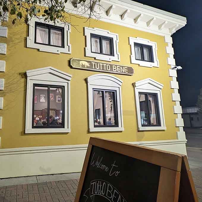 When the welcome sign sits beneath that glowing facade at dusk, you know something special is waiting inside those doors.