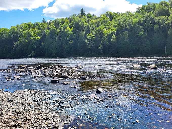 The Menominee River spreads wide and confident here, like it knows exactly how good it looks.