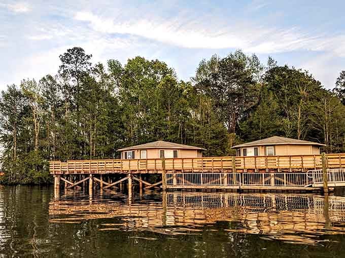 Golden hour hits these pier cabins like a postcard you'd never believe was real until you're standing there.
