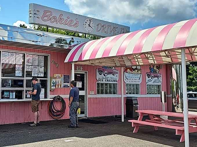 That pink-and-white striped awning isn't just decoration; it's a beacon calling you home to comfort food paradise.
