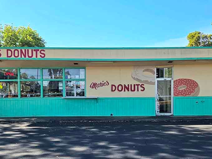 That turquoise trim isn't trying to be retro, it just is, like a perfectly preserved time capsule of donut excellence.