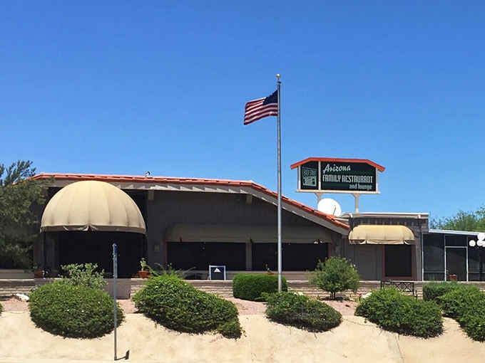 That terracotta roof and American flag say it all: this is a place with genuine Arizona soul.