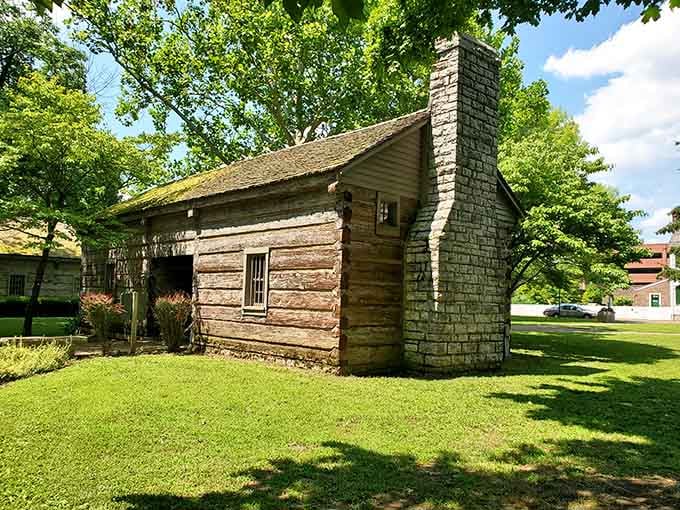 Log cabins with stone chimneys: the original Kentucky starter home, minus the HOA fees and property taxes.