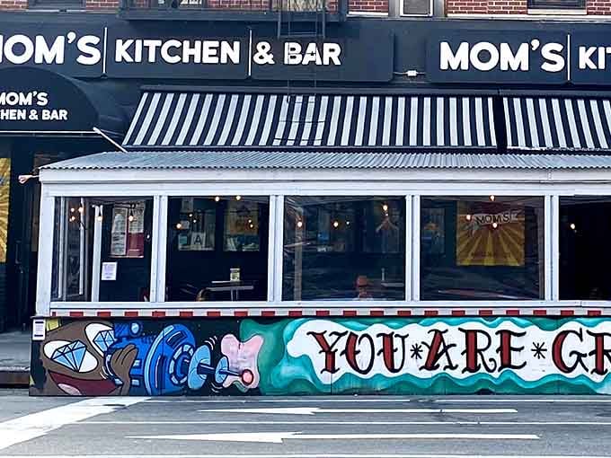 A striped awning, a colorful mural, and a menu worth crossing town for. New York, this one's yours.