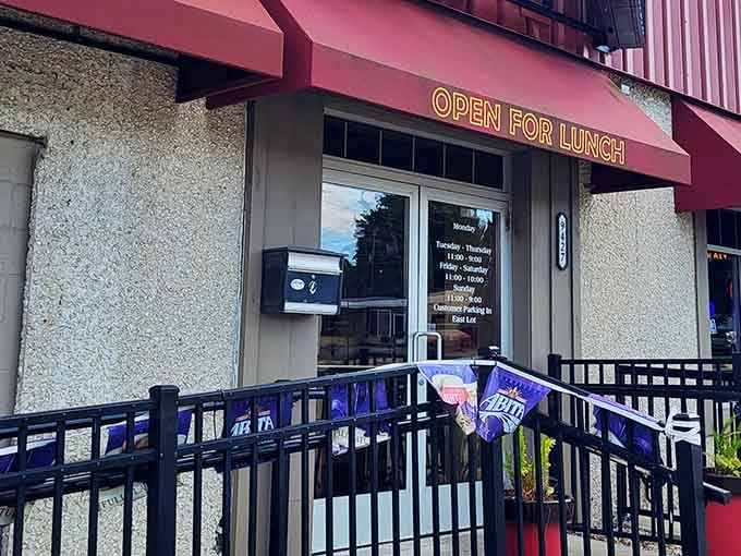 Abita flags and an open door, New Orleans is officially calling your name from West Allis.