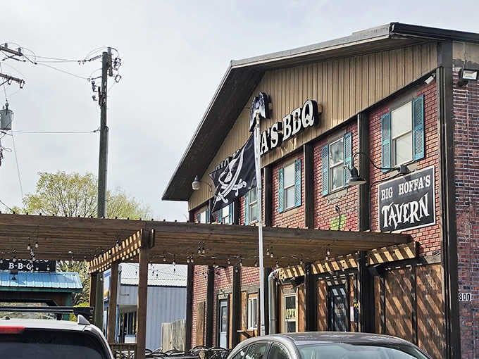 The brick exterior and welcoming patio tell you this is where serious barbecue happens in Westfield, Indiana.