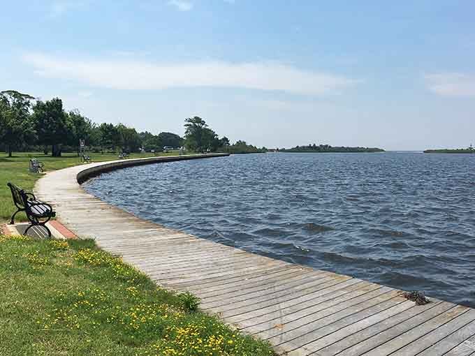 That boardwalk curve isn't just pretty, it's the Great South Bay quietly saying, "Sit down, stay awhile."