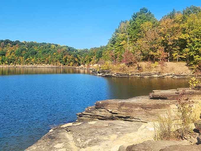 Flat limestone shelves, mirror-still water, and autumn color so vivid it looks like nature hired a professional decorator.