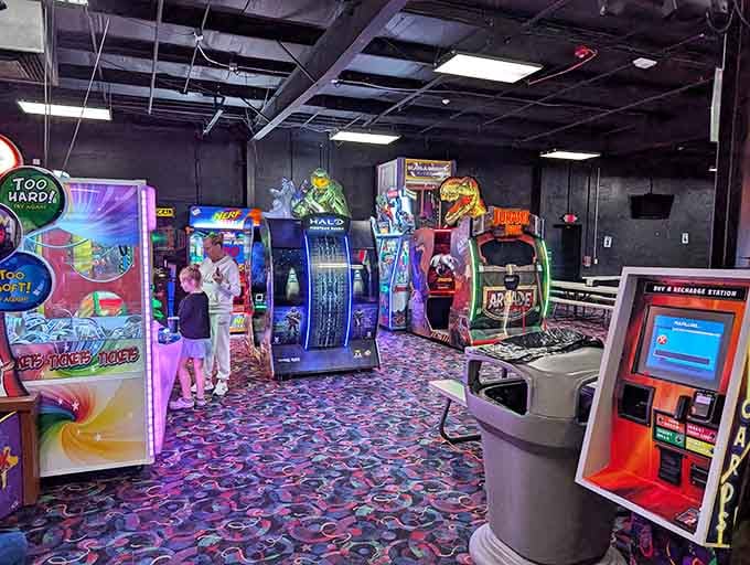 Classic arcade games like Halo and Jurassic Park line the floor, ready to swallow your tokens whole.