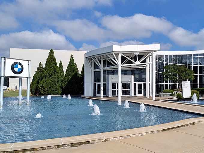 The BMW Zentrum rises from its reflecting pools like a temple dedicated to the automotive gods of Bavaria.