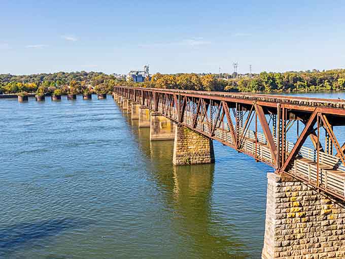 Rust, stone, and river water — Alabama's most photogenic bridge to nowhere stretches proudly across the Tennessee.