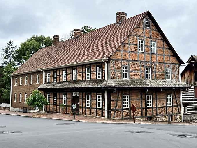 The Single Brothers House stands exactly as it has for centuries, half-timbered and completely unbothered by modern architecture trends.